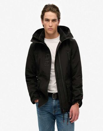 Superdry Ultimate Windbreaker mit Kapuze und Stickerei in Schwarz