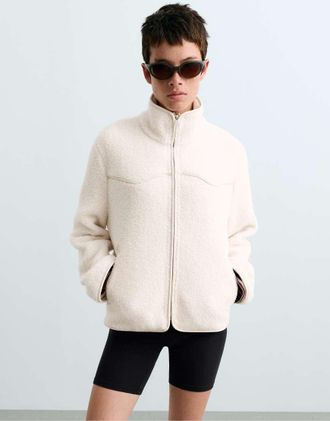 Oysho Jacke mit Paspelierung aus Kunstfell in Ecru-Neutral