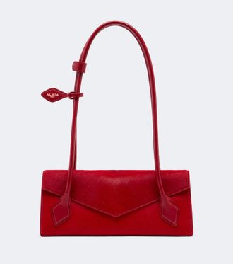 Alaia Ala&iuml;a Sac Le Teckel Small en cuir fa&ccedil;on poulain
