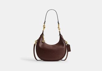 Coach Jonie Tasche 22