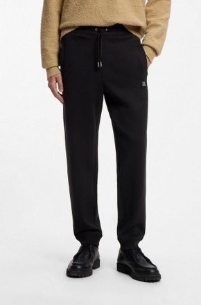 HUGO BOSS Sweathose Dimacs Metal Logo elastischer Bund mit Kordel, Relaxed Fit, Premium Interlock