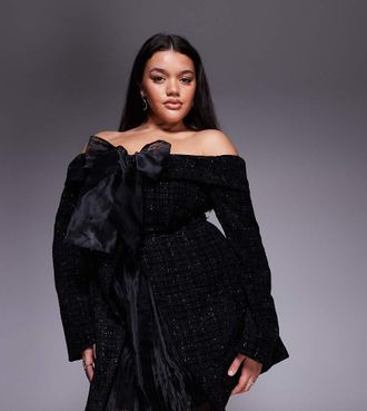Asos Curve - Robe courte en maille boucl&eacute;e &agrave; encolure Bardot avec jupe pliss&eacute;e et noeud - Noir