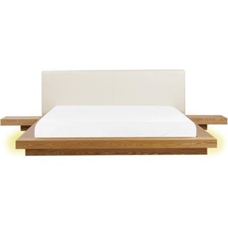 Beliani LED-Bett Naturfarbene Esche Kunstleder u. MDF-Platte Holzfurnier Lattenrost 180x200 cm 2 Nachttische Hohes Kopfteil Japanischer Stil Futonbett