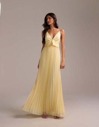 Asos Robe longue hybride de demoiselle dhonneur &agrave; fines bretelles et jupe pliss&eacute;e - Citron-Jaune