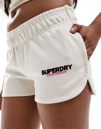 Superdry Sportswear - Short de course &agrave; logo - Blanc riz