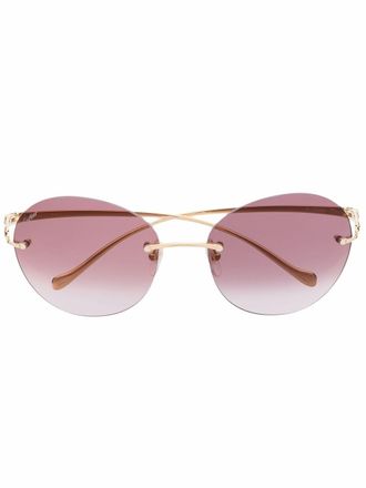 Cartier lunettes de soleil &agrave; monture ronde - Or
