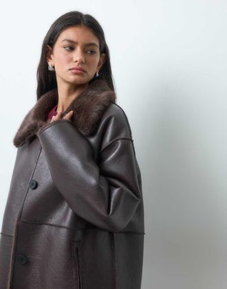 Asos veste longue en peau retourn&eacute;e avec doublure en faux-fur marron fonc&eacute;