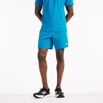 New Balance Homme Sport Unlined Brand Graphic Short 7 en Bleu, Polytiss&eacute;, Taille XS