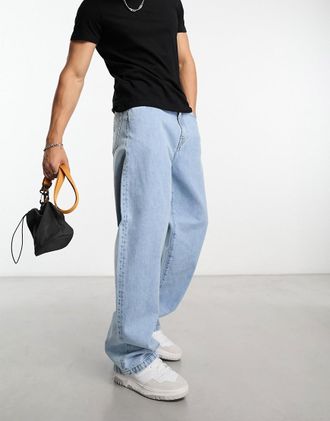 Carhartt Work in Progress Landon - Schmal zulaufende Jeans mit lockerem Schnitt in gebleichtem Blau