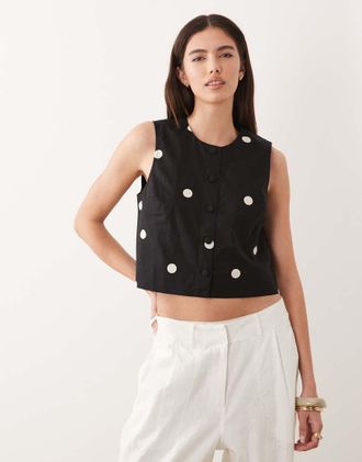 Nobody's Child Shirley - Top boutonn&eacute; sans manches en coton - Noir &agrave; pois