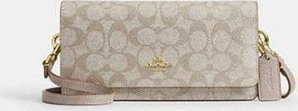 Coach Evie Umh&auml;ngetasche aus Signature Canvas f&uuml;r Frauen in Beige