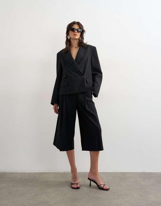 Topshop Tief sitzender Hosenrock in Schwarz