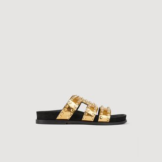 Sandro Flache Sandalen mit Nieten