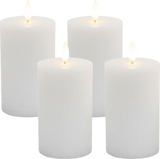 Relaxdays LED Kerzen, 4er Set, HxD: 13 x 7,5 cm, flackernde Flamme, Echtwachs, Rillen, flammenlose Blockkerzen, wei&szlig;