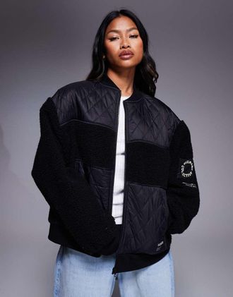 Asos Weekend Collective - Bomberjacke aus Teddyfell in Schwarz mit durchgehendem Reißverschluss und Detail aus Nylon