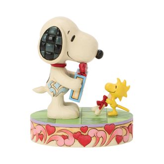 Enesco Peanuts by Jim Shore Snoopy und Woodstock mit Geschenkfigur, 13 cm, Mehrfarbig