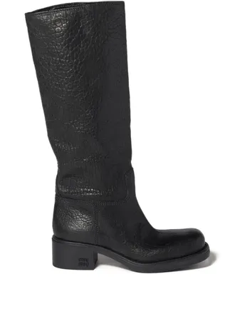 Miu Miu bottines en cuir &agrave; logo emboss&eacute; - Noir