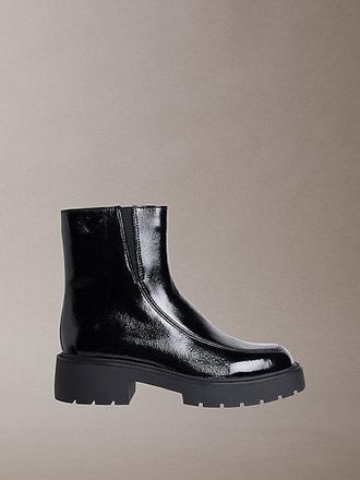 Calvin Klein Bottes &eacute;paisses en cuir &agrave; talons et fermeture &eacute;clair