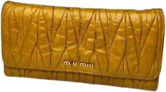 Miu Miu Portefeuille vintage matelass&eacute; en cuir pr&eacute;-poss&eacute;d&eacute; - Femme - Pre-owned - Jaune - Taille: ONE Size
