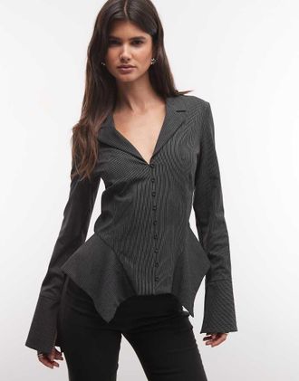 Weekday chemise &agrave; empi&egrave;cement sur les hanches &agrave; carreaux noirs