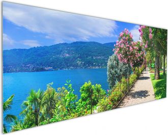 Wallario K&uuml;chenr&uuml;ckwand aus Glas 125 x 50 cm, Motiv: Bl&uuml;tenpromenade am Seeufer | Spritzschutz abwischbar & pflegeleicht