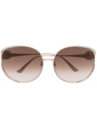 Gucci lunettes de soleil GG &agrave; monture oversize - Or
