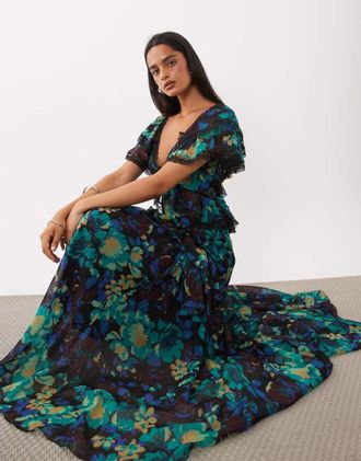 Asos robe longue &agrave; volant sur lourlet avec d&eacute;tail de bordure et dos nu noire &agrave; fleurs-Multi