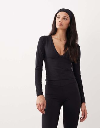 Tala DayFlex - Top manches longues &agrave; col V et brassi&egrave;re int&eacute;gr&eacute;e - Noir
