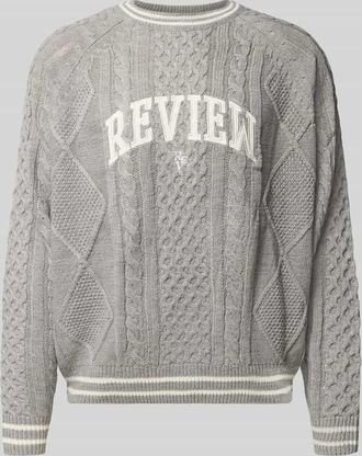 Review Strickpullover mit Label-Stitching