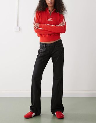 Weekday Nova - Jean bootcut évasé coupe slim à taille basse avec coutures tournantes sur les côtés - Noir enduit