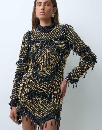 Asos robe courte &agrave; manches longues orn&eacute;e de perles noire et dor&eacute;e