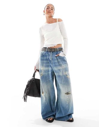 Collusion X007 - Superweite Jeans in Used-Waschung mit verstellbarem, niedrigem Bund-Blau