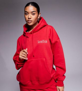 KAIIA Exclusivit&eacute; - Kaiia - Sweat &agrave; capuche densemble oversize en coton m&eacute;lang&eacute; avec logo orn&eacute; de strass - Rouge