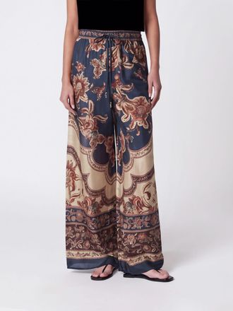 Zimmermann Pantalon palazzo Aster en soie &agrave; taille haute et imprim&eacute; ethnique