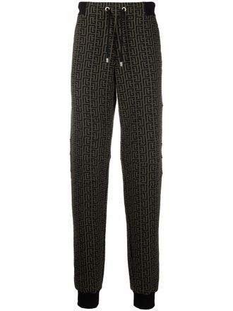 Balmain pantalon de jogging &agrave; imprim&eacute; monogramm&eacute; - Marron
