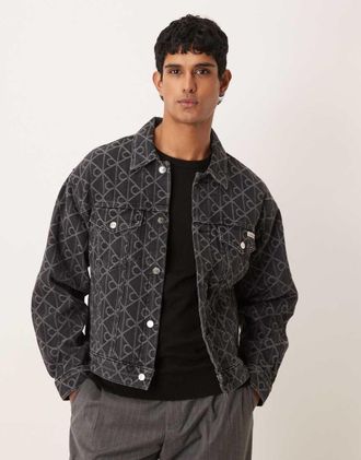 Calvin Klein Jeans Trucker-Jeansjacke in Schwarz mit CK-Emblem-Jacquardmuster