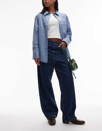 Carhartt Work in Progress Brandon - Jeans mit lockerem, geradem Schnitt und schwarzer Waschung-Blau