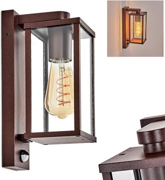 HOFSTEIN Außenwandleuchte Tourega, Außenwandlampe mit Bewegungsmelder aus Metall/Glas in Rost/Klar, Leuchte im Industrial-Design für Garten/Außenfassade/Außenb