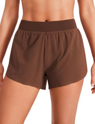 CRZ YOGA Damen Mid Waist Running Shorts Seitliche Splits Sport Workout Kurze Hose Leichte Atmungsaktive Sporthose Laufhose Kaffeebraun 40