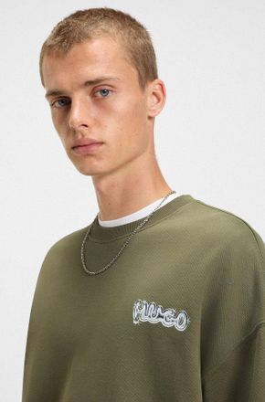 HUGO BOSS Sweatshirt Nyrocrew R&uuml;ckenaufdruck in Chrom-Optik, Rundhalsausschnitt, Loose fit