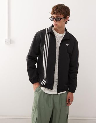 adidas Originals Firebird - Trainingsjacke in Schwarz mit Streifen vorne