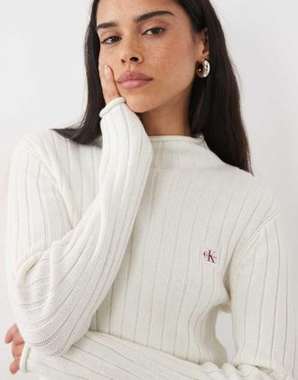 Calvin Klein Jeans Pullover mit Weblabel, Rollkragen und R&uuml;schenkante in Wollwei&szlig;