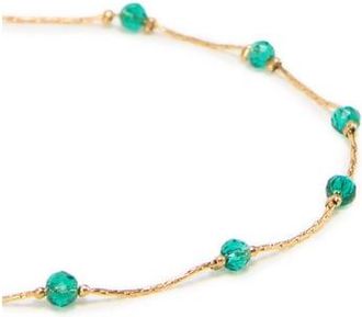 Au Printemps Paris Bracelet avec perles en verre