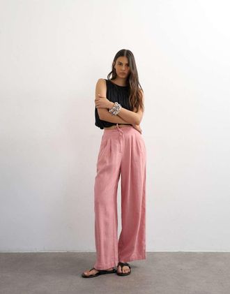 Topshop Pantalon coupe ballon en lin &agrave; taille &eacute;lastique - Rose