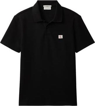 Calvin Klein Polo c&ocirc;tel&eacute; &agrave; logo en coton m&eacute;lang&eacute;