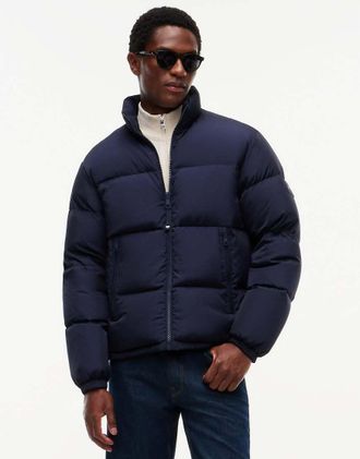 Tommy Hilfiger Flag-Jacquard wendbare Daunen-Pufferjacke in Marineblau