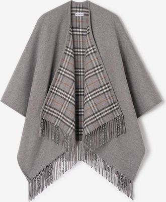 Burberry Cape r&eacute;versible en laine Check