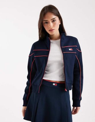 Tommy Jeans Jacke in Marineblau mit Paspelierung, Logo-Aufn&auml;her und Rei&szlig;verschluss, Kombiteil