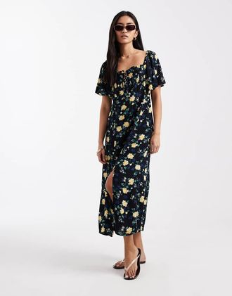 Levi's Amara - Robe mi-longue avec manches &eacute;vas&eacute;es et imprim&eacute; fleurs - Noir