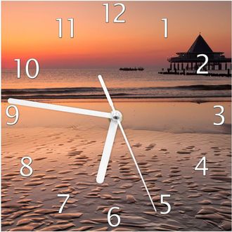 Wallario Design-Wanduhr Strand am Abend - Seebrücke am Ostseebad Heringsdorf aus Glas, Motiv-Uhr Größe 20 x 20 cm, weiße Zeiger
